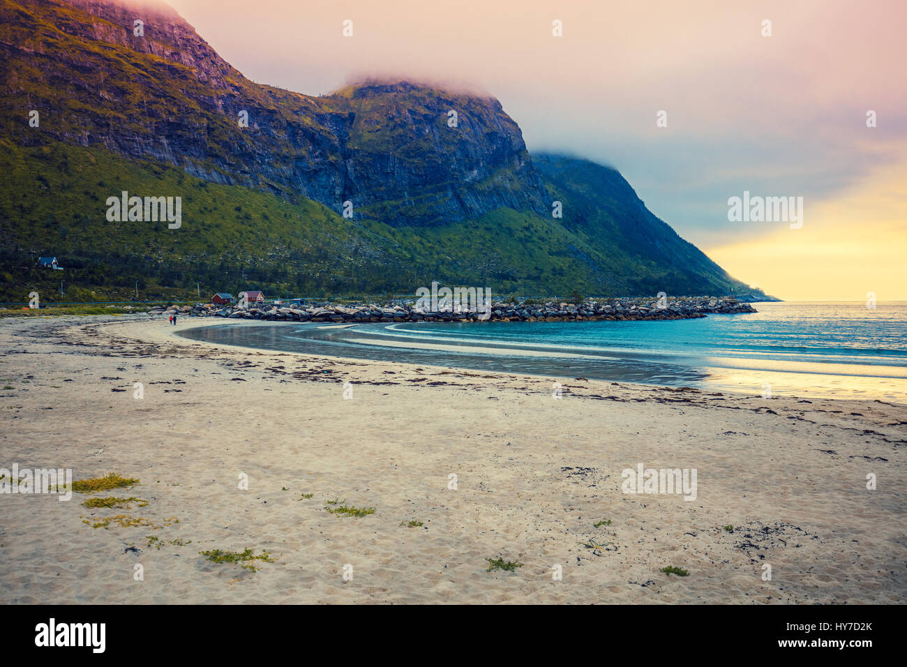 Fjord at sunset. Rocky beach in evening. Beach with white sand ...