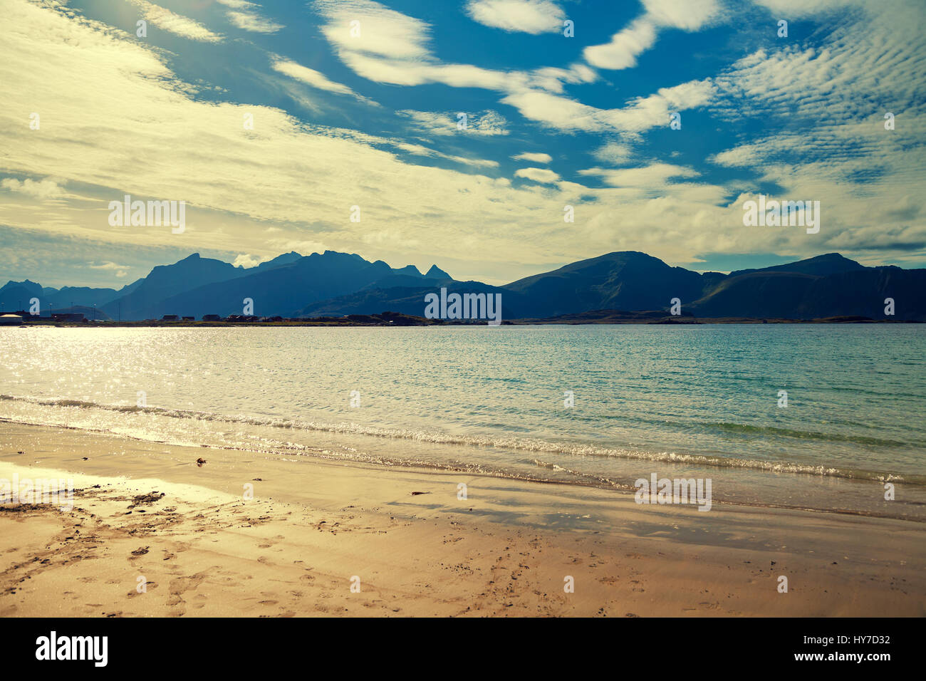 Fjord at sunset. Rocky beach in evening. Beach with white sand ...
