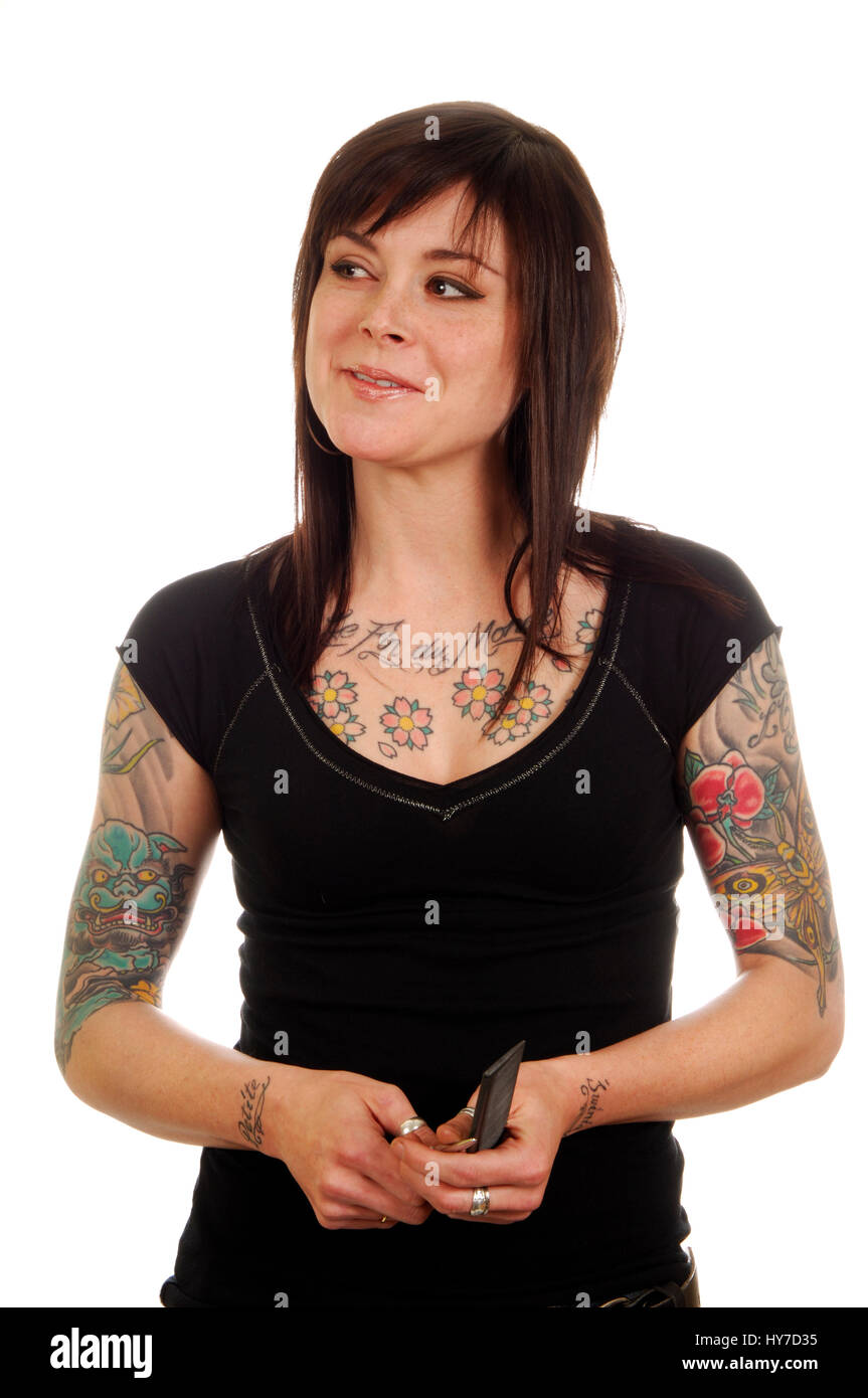 Happy Stylist with body art tattoos Stock Photo - Alamy