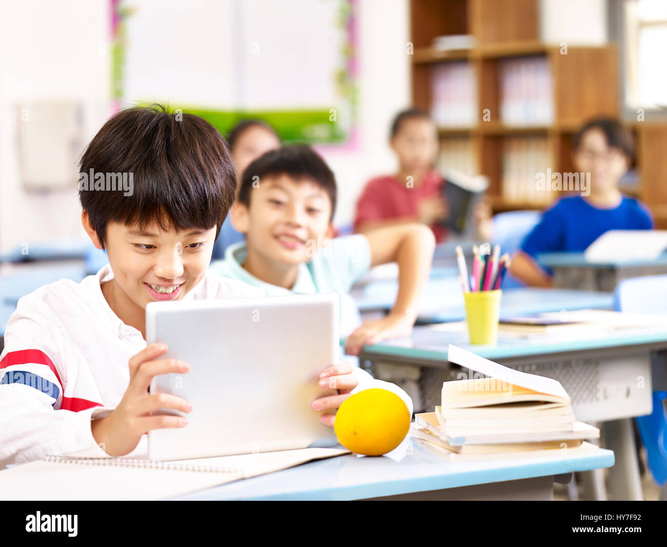 Child using computer classroom High Resolution Stock Photography and ...