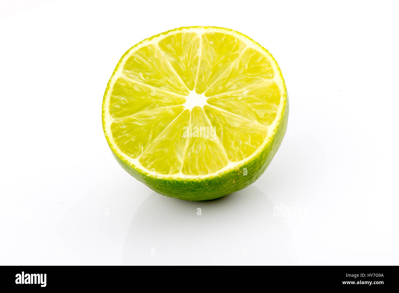 slice of lime isolated on white background Stock Photo - Alamy