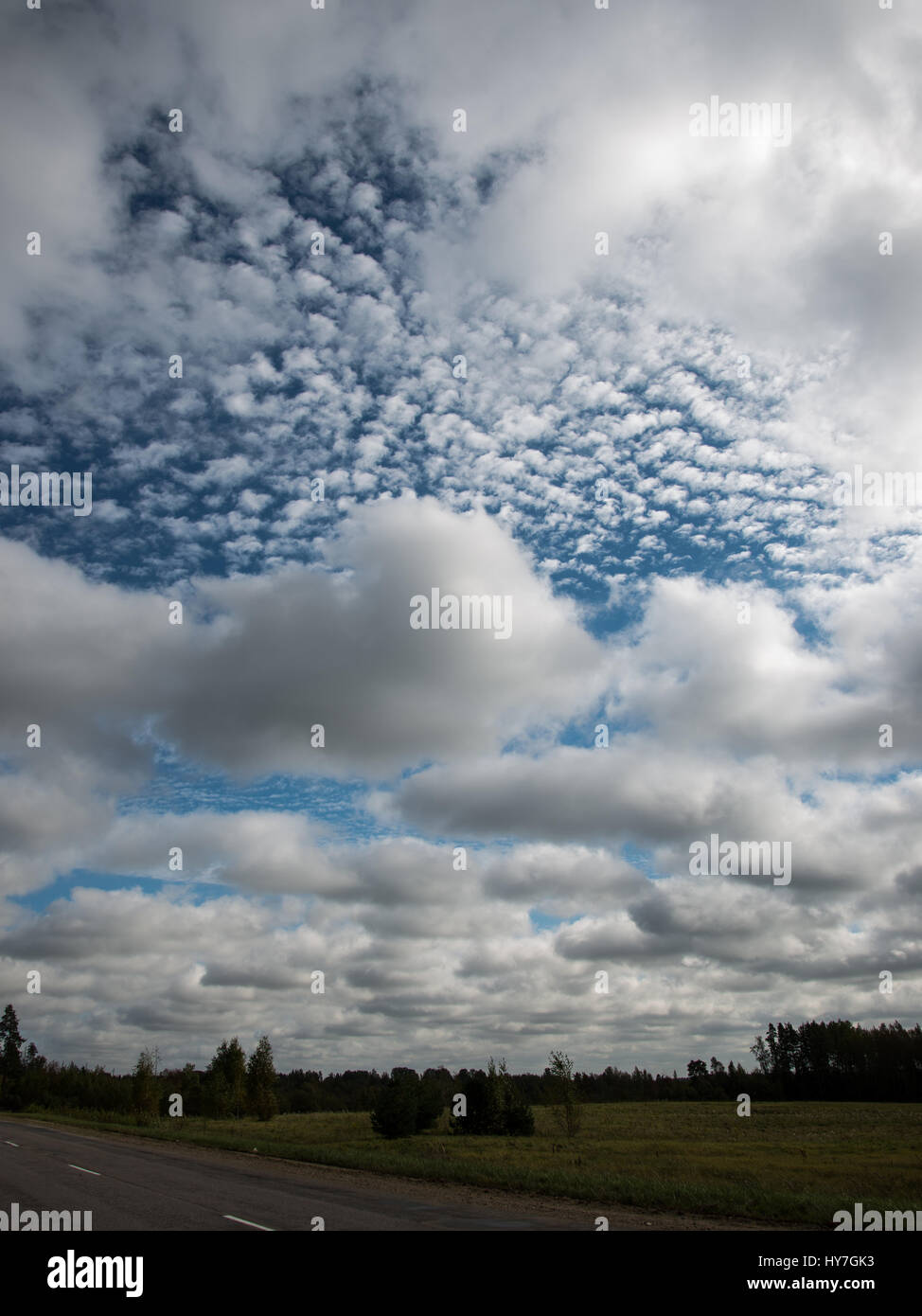 Country landscape under morning sky with clouds. Overcast sky before ...