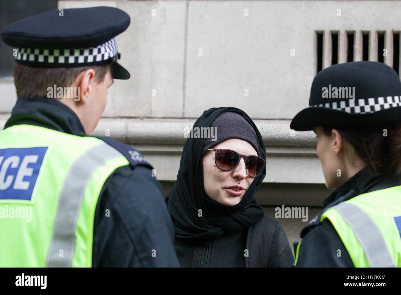 London, UK. 1st April, 2017. Police officers seach supporters of Unite ...