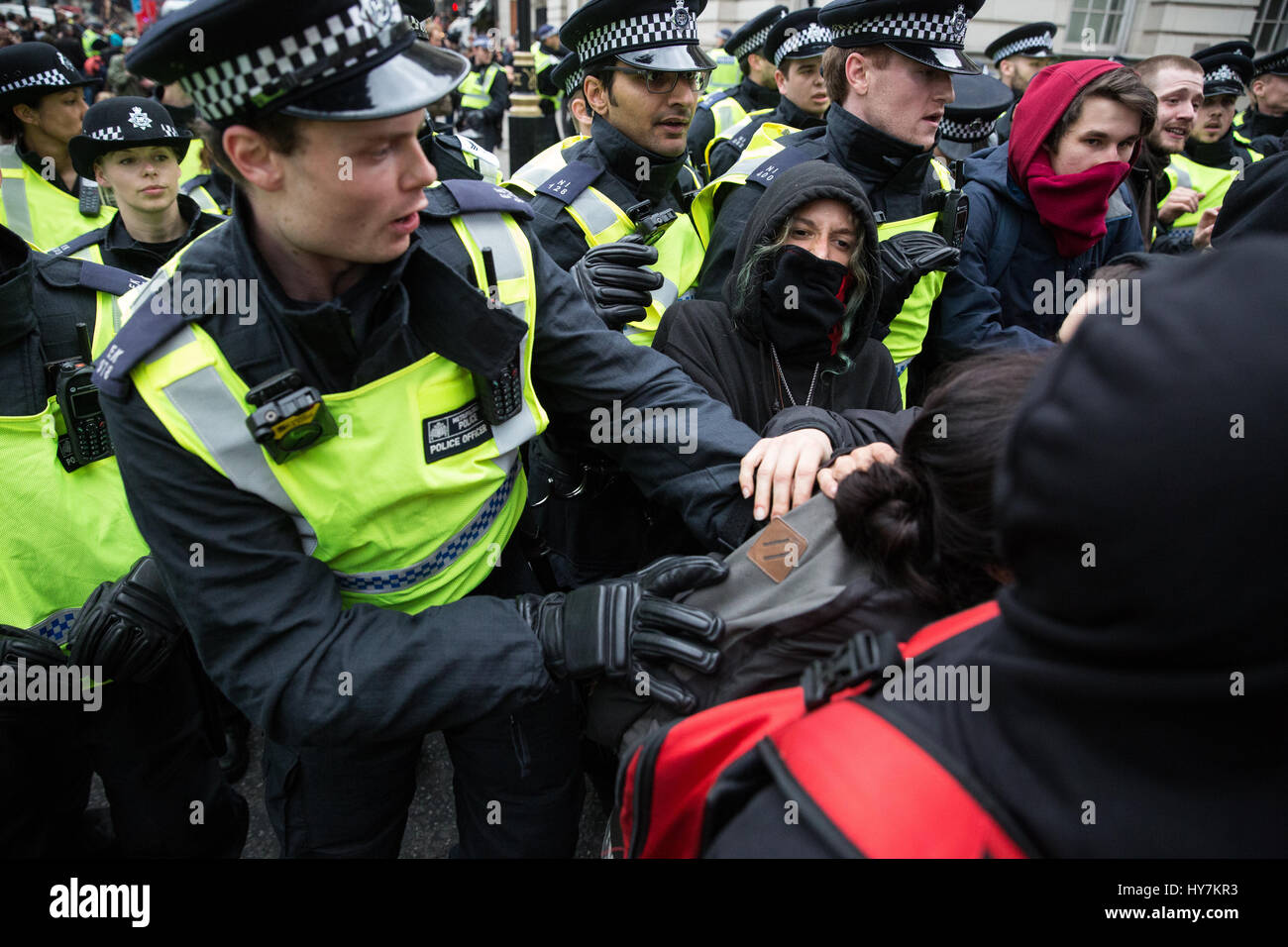 London, UK. 1st April, 2017. Police officers move supporters of Unite ...