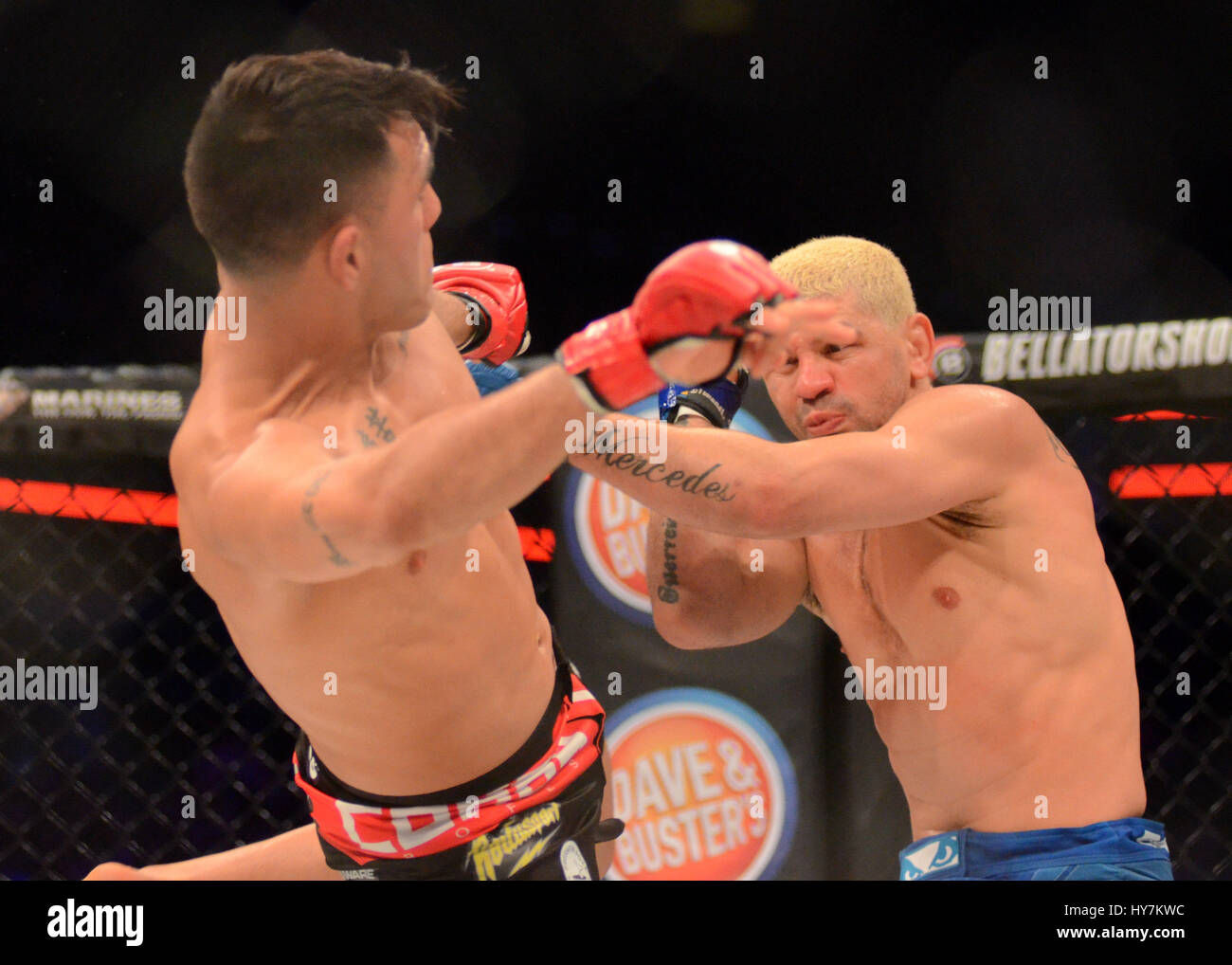 Rosemont, Illinois, USA. 31st Mar, 2017. Marcos Galvao (blue tape) and ...