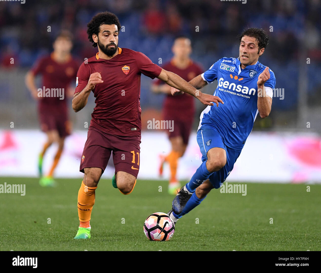 Rome, Italy. 1st Apr, 2017. Roma's Mohamed Salah (L) competes with ...