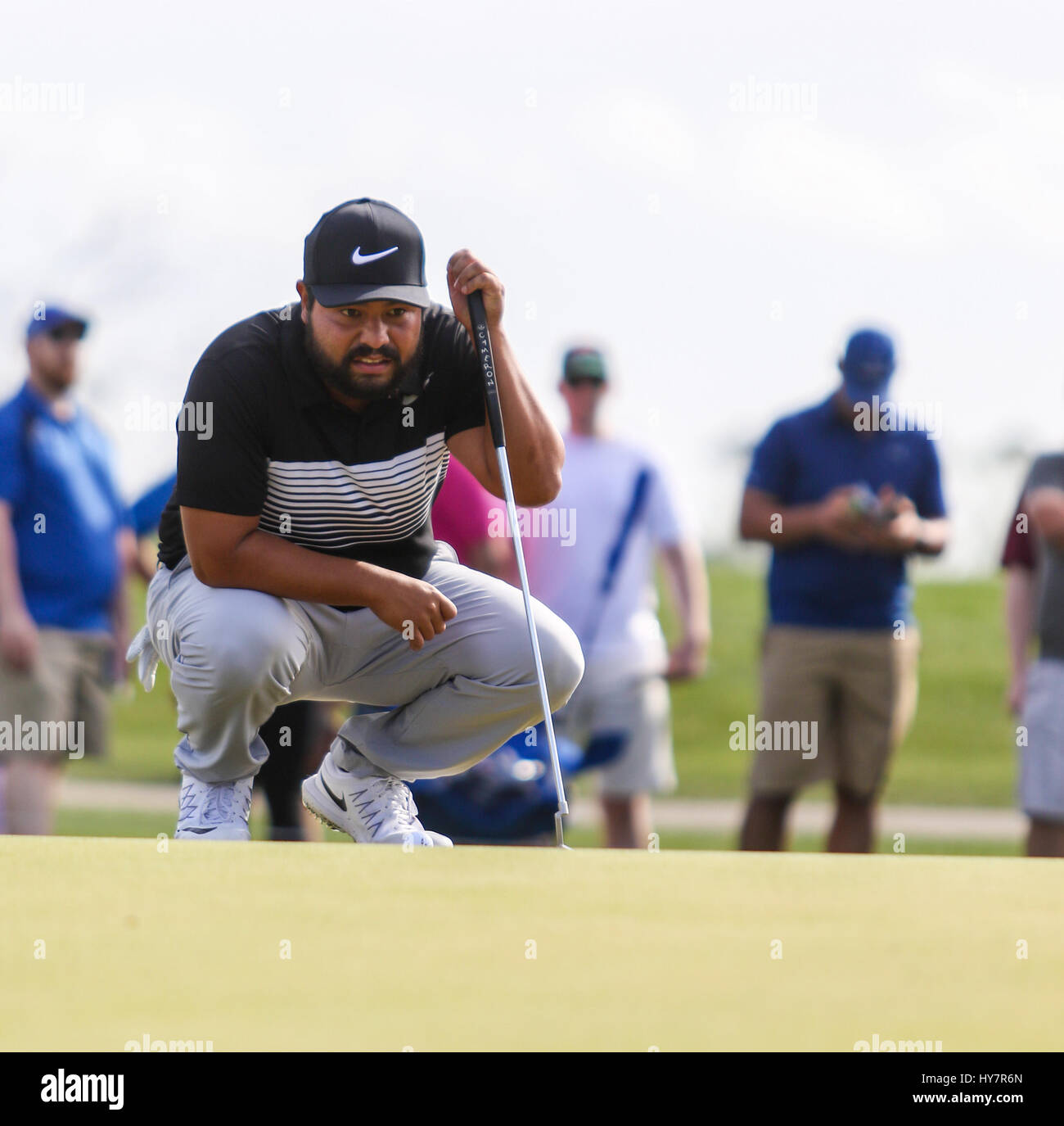 Humble, Texas, USA. 1st Apr, 2017. J.J. Spaun sizes up a put on the 1st ...