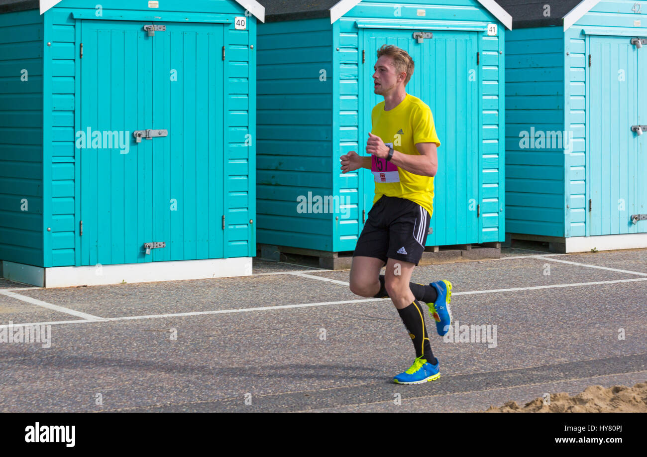 Man running along promenade at bournemouth hi-res stock photography and ...