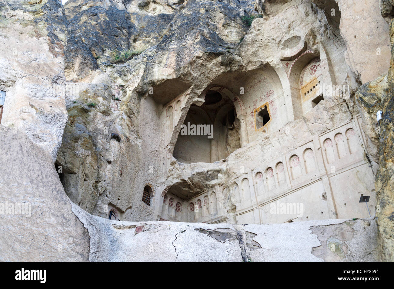 View of famous and natural cave basilica and fairy chimneys in Goreme ...