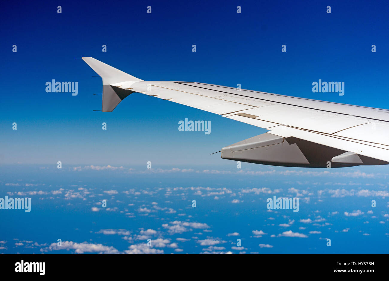 Wing of an airplane, view from window Stock Photo - Alamy