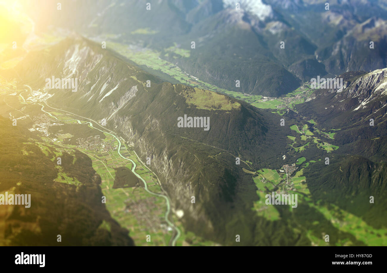 Aerial view of village in the mountains of the Alps Stock Photo - Alamy