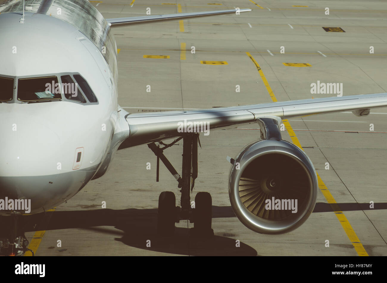 Close-up view of airplane on airfield in airport Stock Photo - Alamy