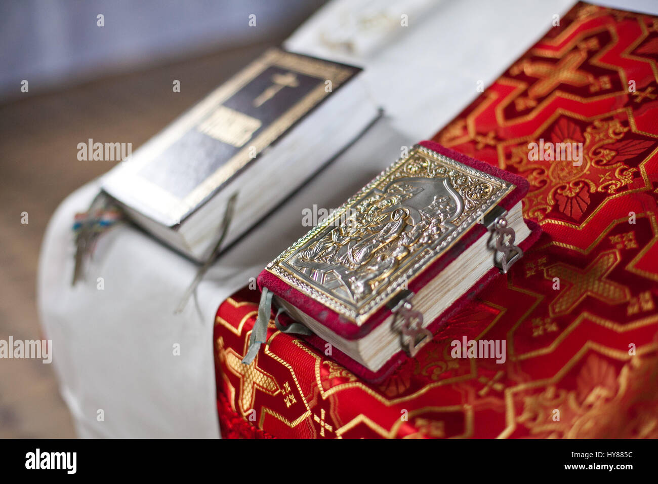 the holy christian bible on a table of the priest close up. concept of ...