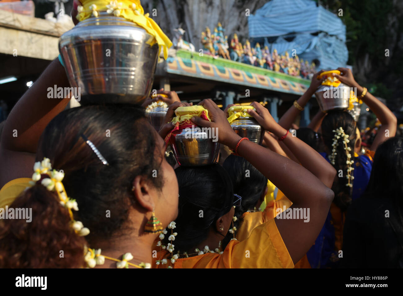 Female paal kudam bearers at Batu Cave temple, Kuala Lumpur Malaysia ...