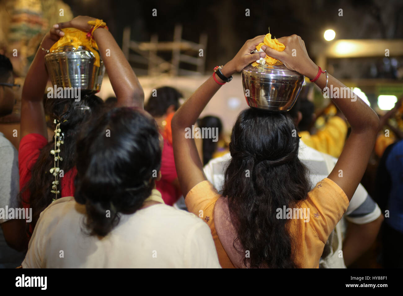 Female paal kudam bearers at Batu Cave temple, Kuala Lumpur Malaysia ...