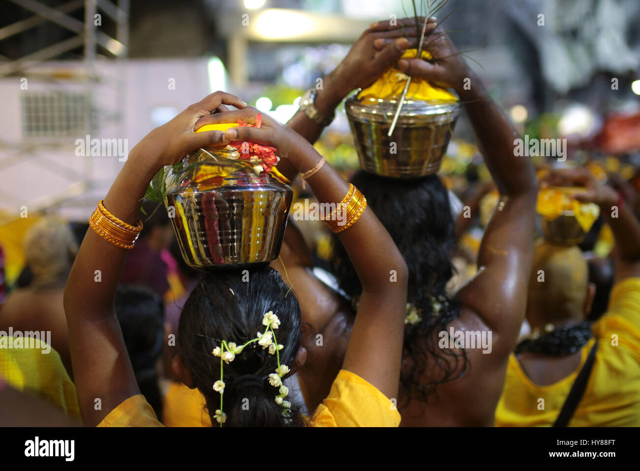 Thaipusam paal kudam couples inside Batu Cave temple, Kuala Lumpur ...