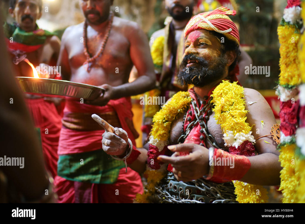 Thaipusam kavadi bearer bestows blessing to believer at Batu Cave ...