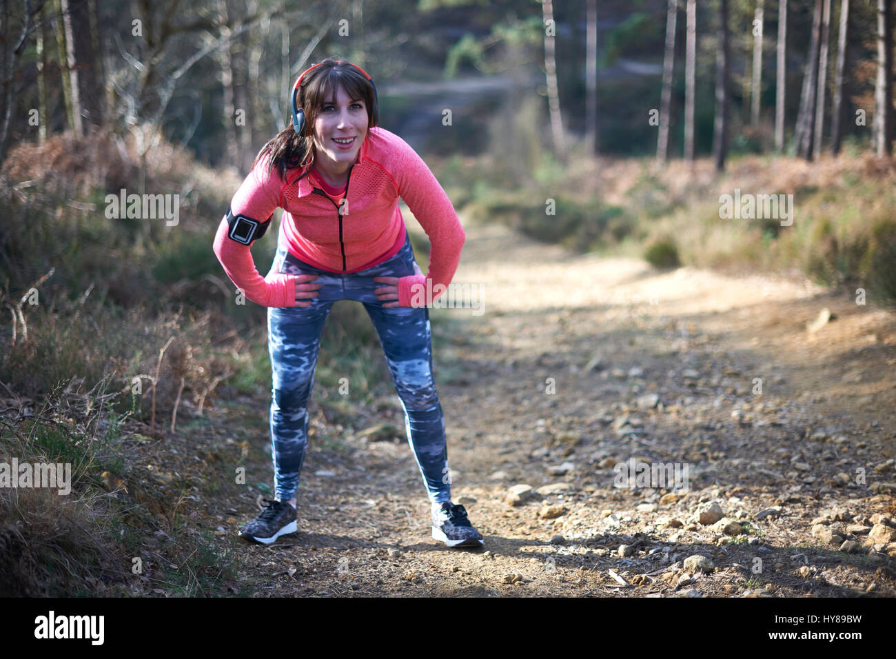 Girl Crawling Up A Hill