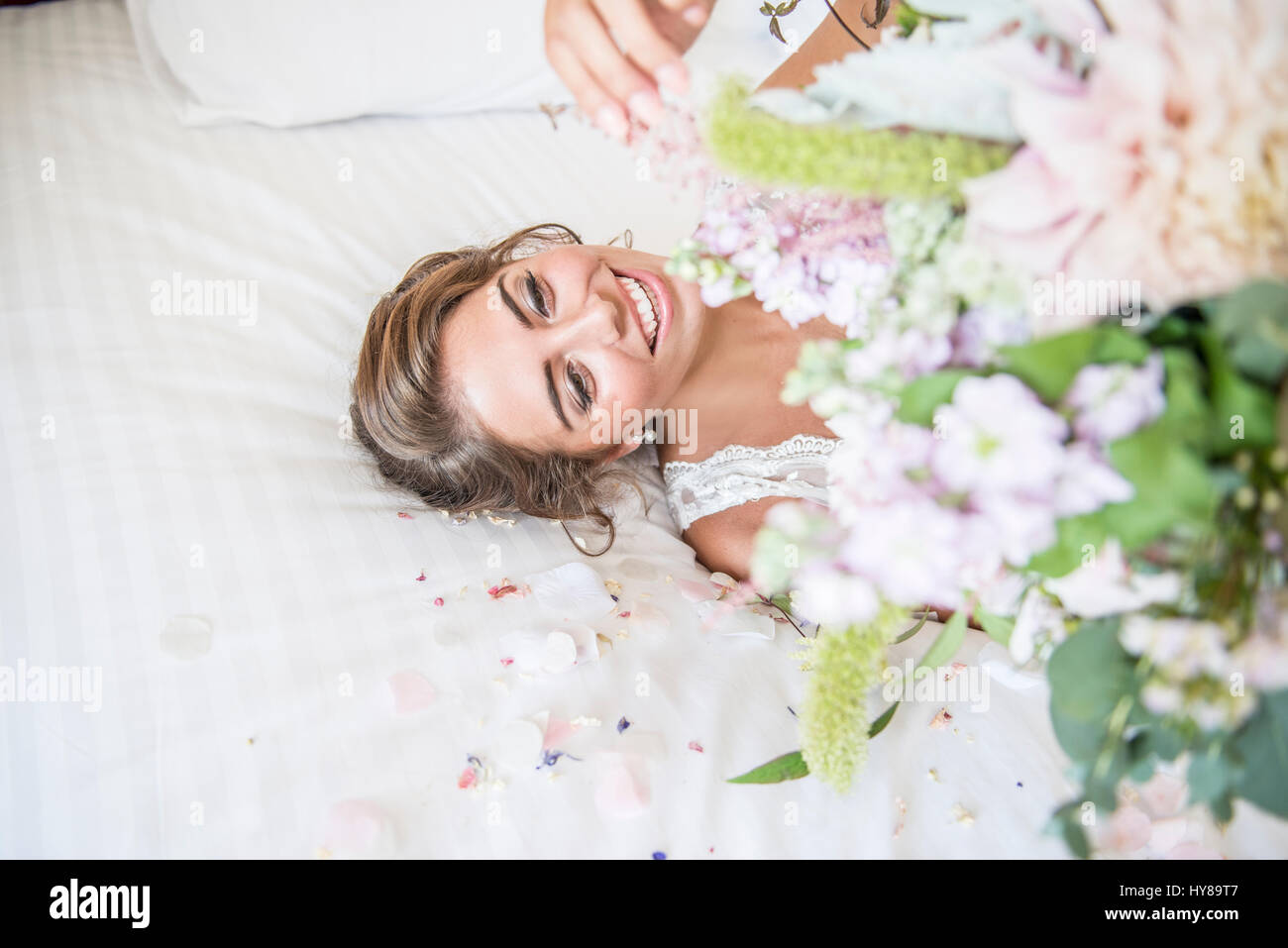 Laying On Bed Stock Photos & Laying On Bed Stock Images - Alamy