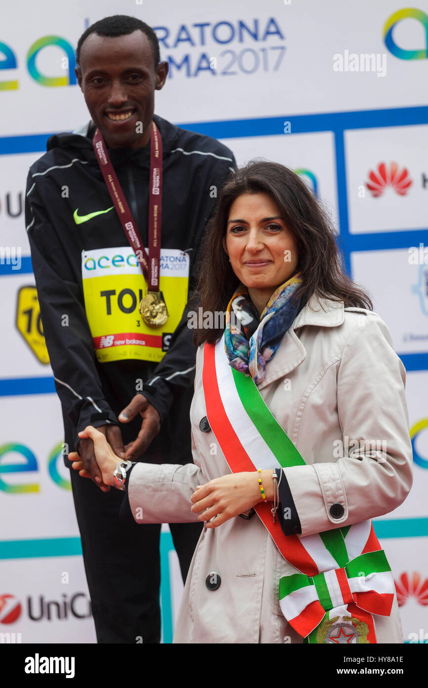 Rome, Italy. 02nd Apr, 2017. Tola Shura Kitata shakes hand with ...