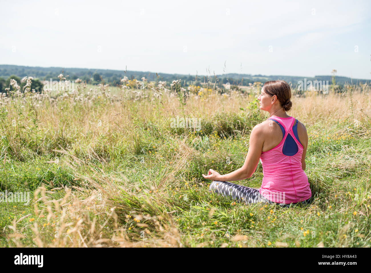 Woman outside in sunshine hi-res stock photography and images - Alamy