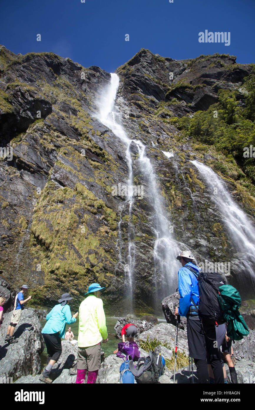 Hikers at Earland Falls on the Routeburn Track Stock Photo - Alamy