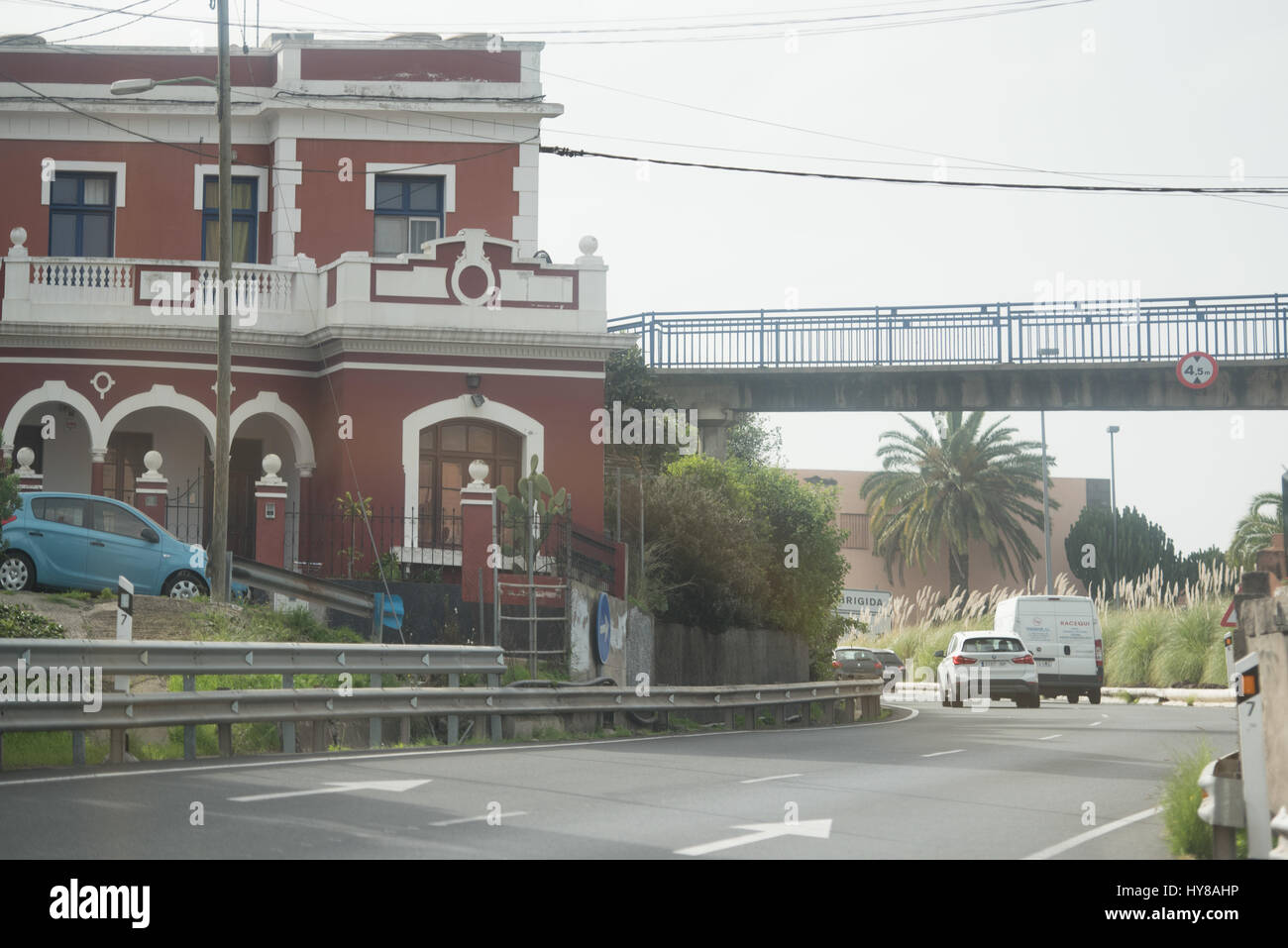 Passenger bridge above road Stock Photo - Alamy