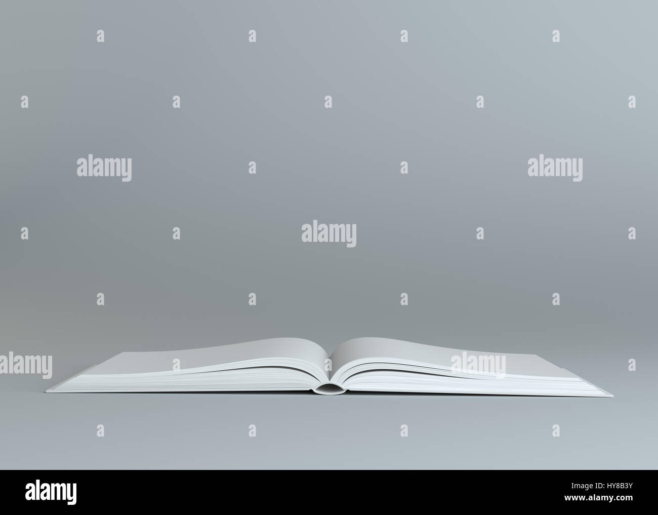 White empty open book on gray background Stock Photo - Alamy