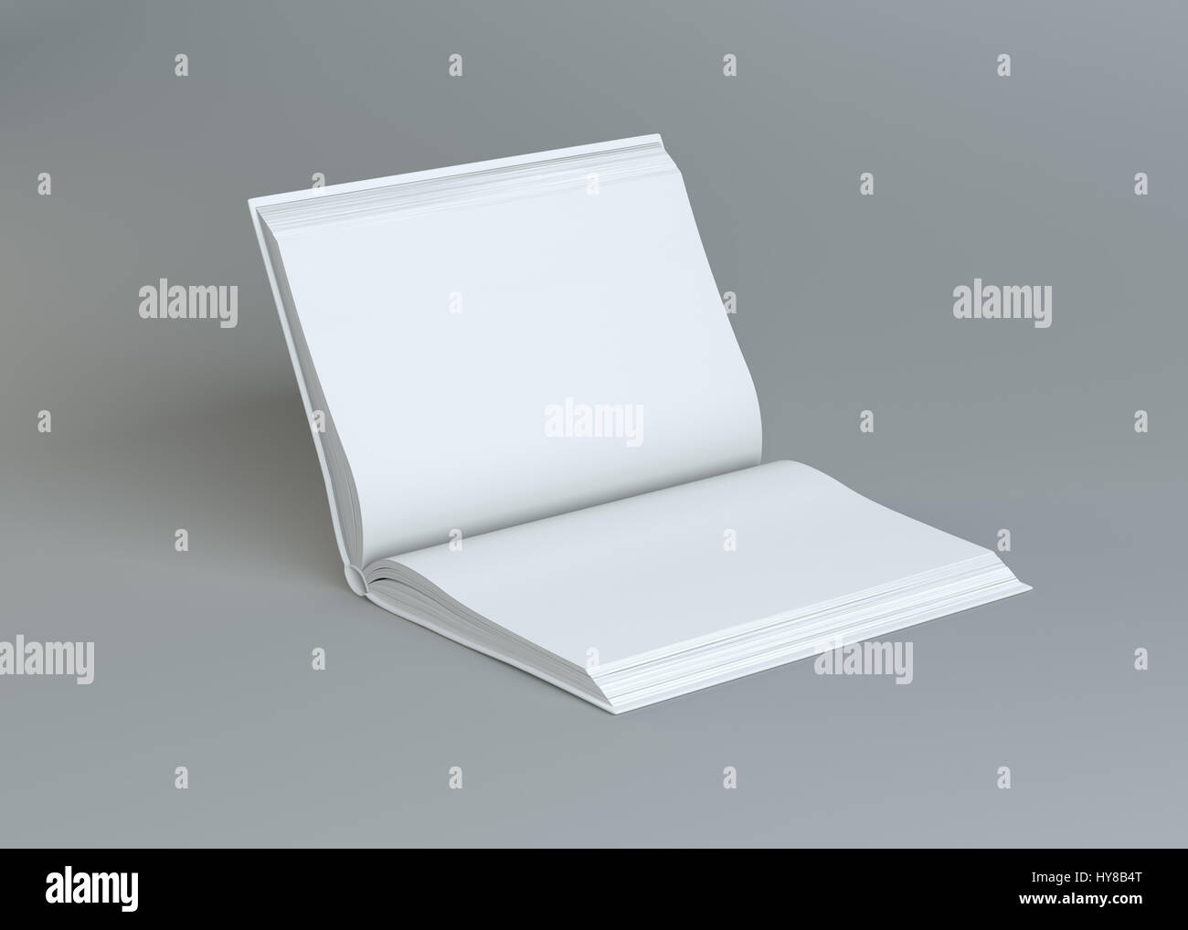 White empty open book on gray background Stock Photo - Alamy