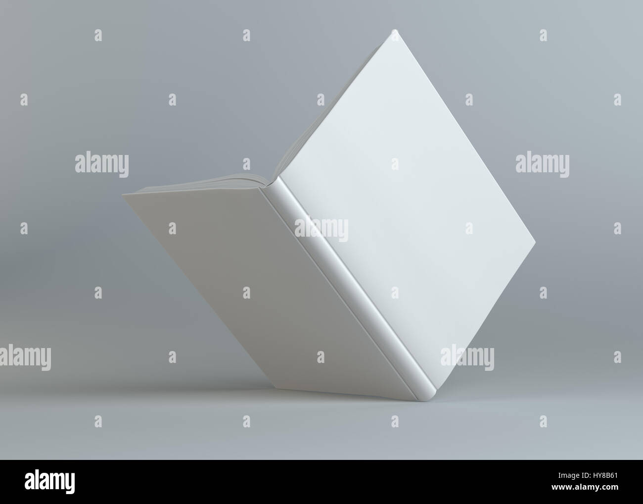 White empty open book on gray background Stock Photo - Alamy