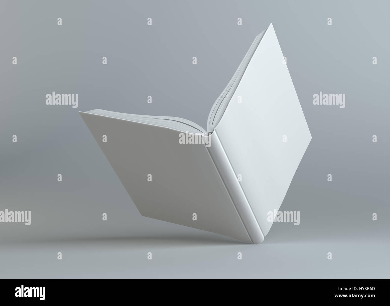 White empty open book on gray background Stock Photo - Alamy