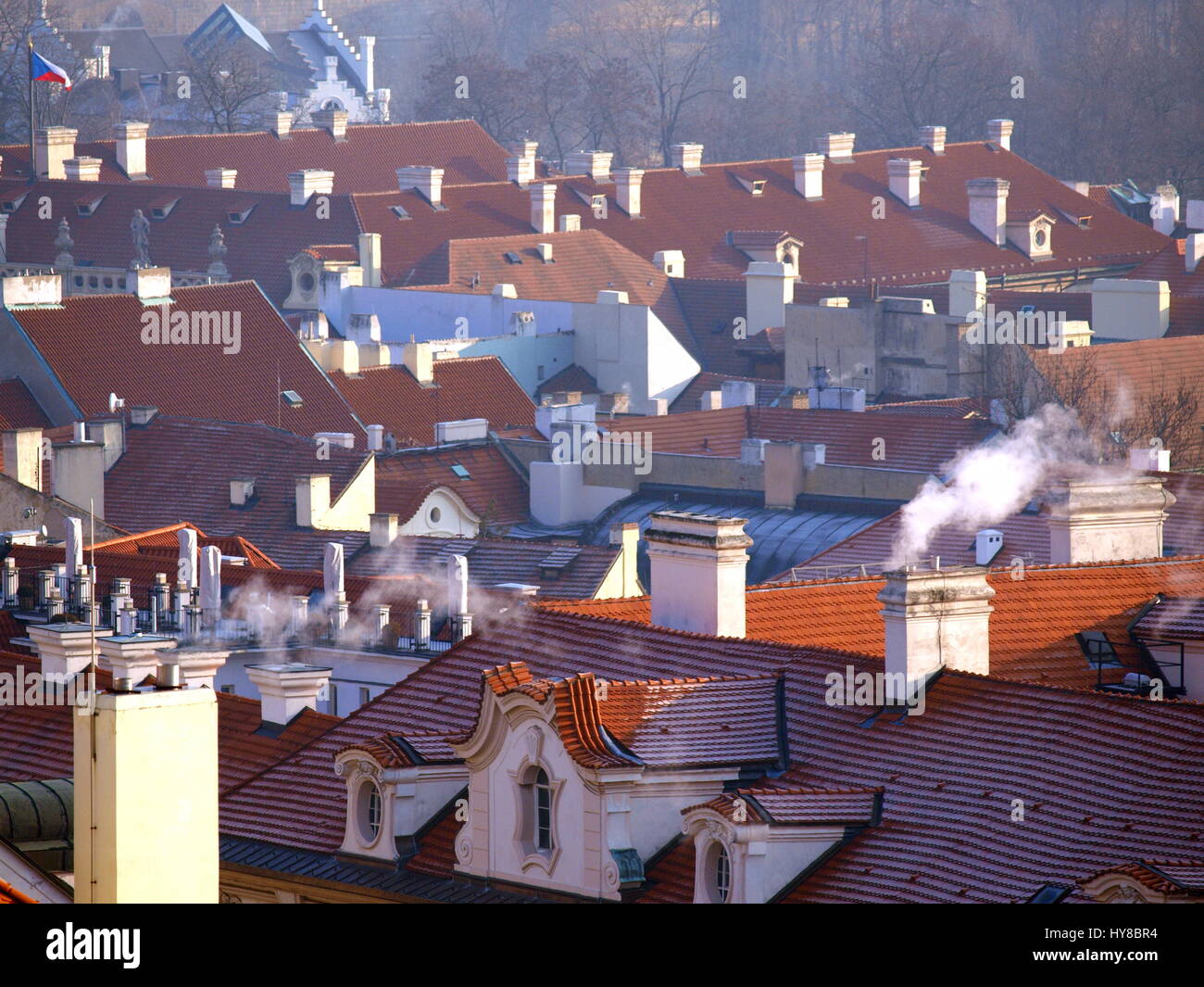 Sights of Prague, rooftops and smokey chimneys, Czech Republic Stock ...