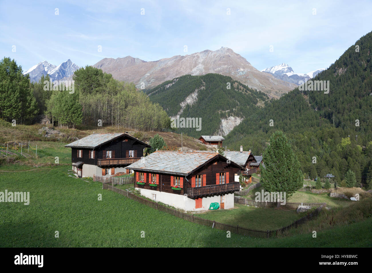Switzerland, traditional swiss cottages and chalets in the hills above ...