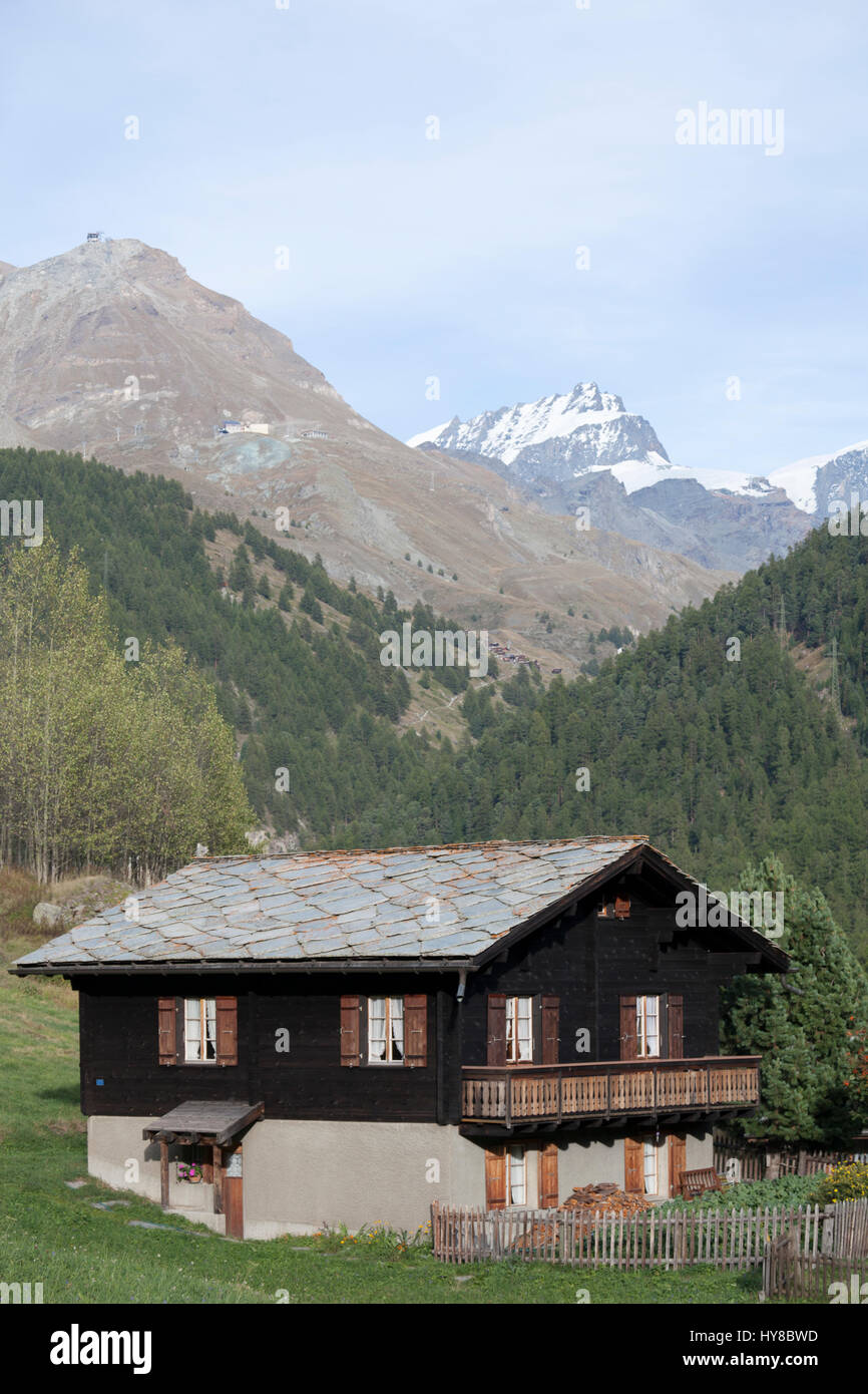 Switzerland, traditional swiss cottages and chalets in the hills above ...