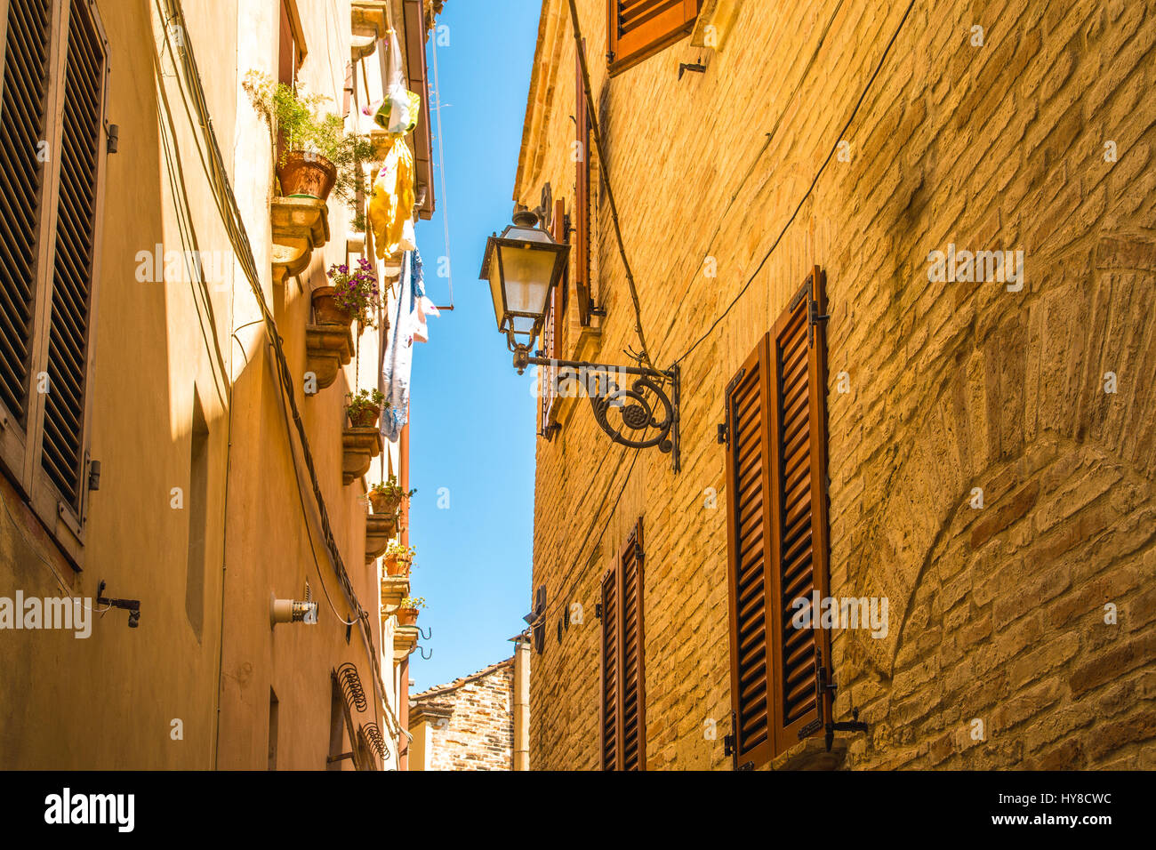 ancient buildings of a typical seaside village in the Marche region in ...