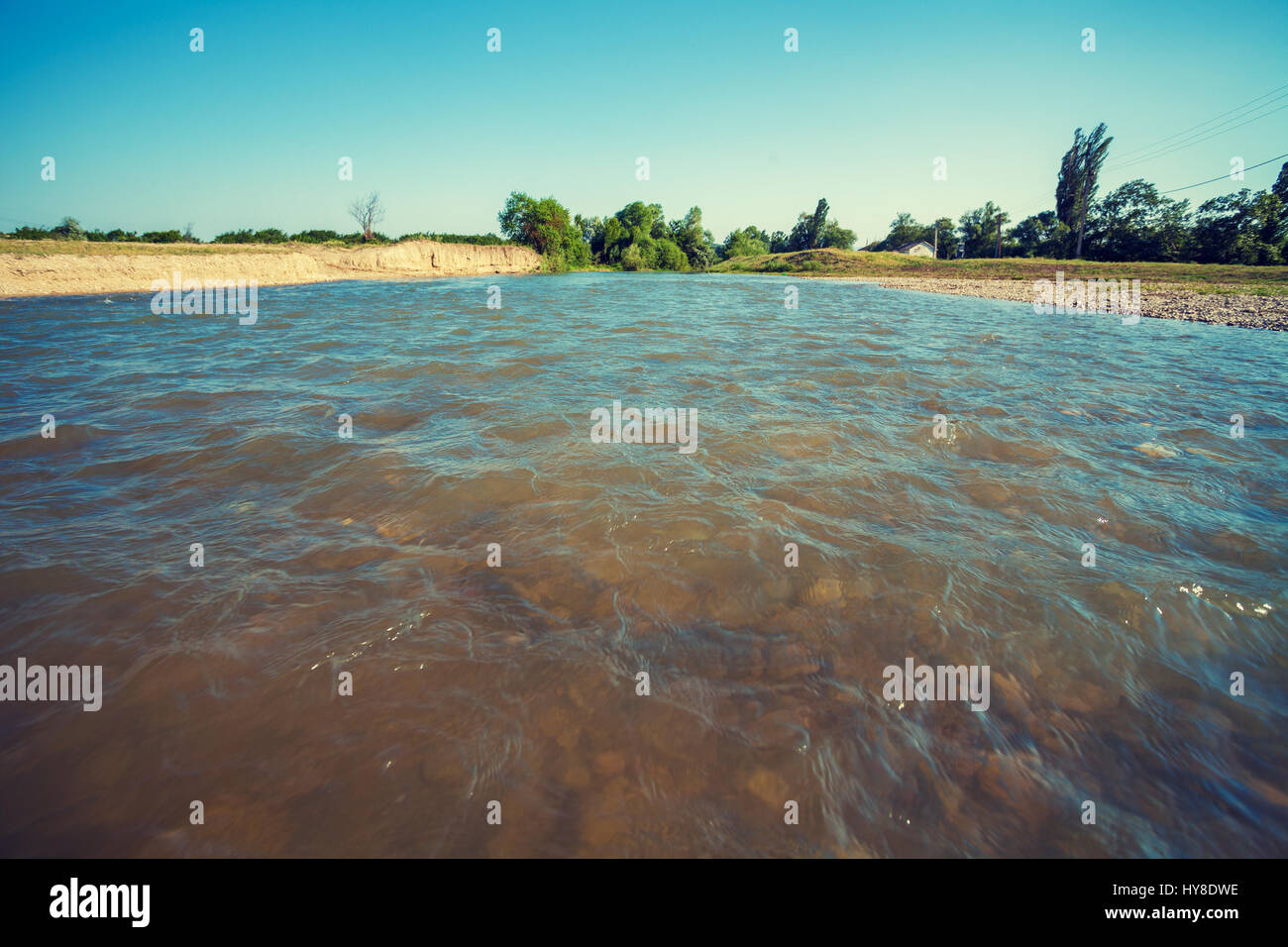Rural landscape with a river Stock Photo - Alamy