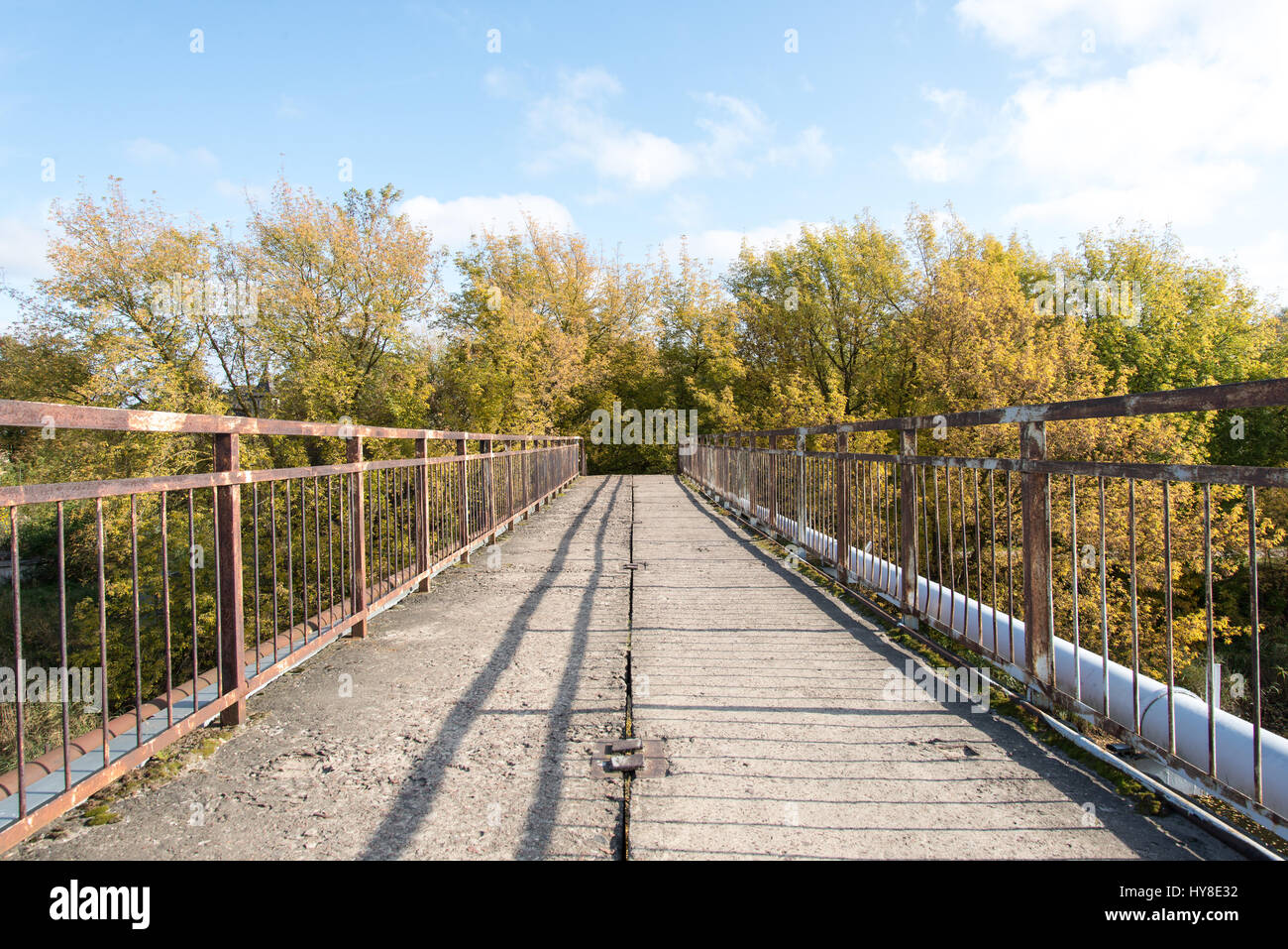 old bridge with rusty metal rails near sea port Stock Photo - Alamy