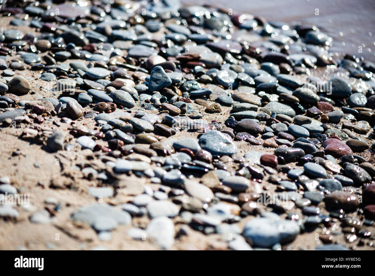 small pebble rock background texture at the beach Stock Photo - Alamy