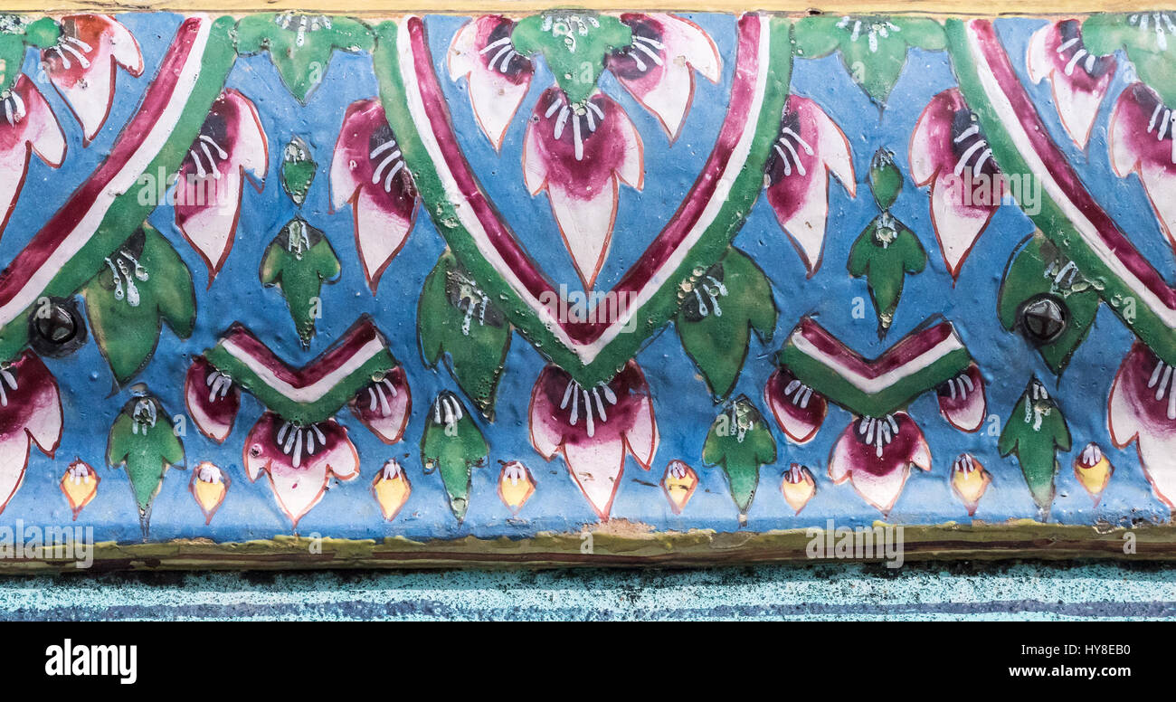 Flower pattern paint in the traditional Thai style on the church tile ...