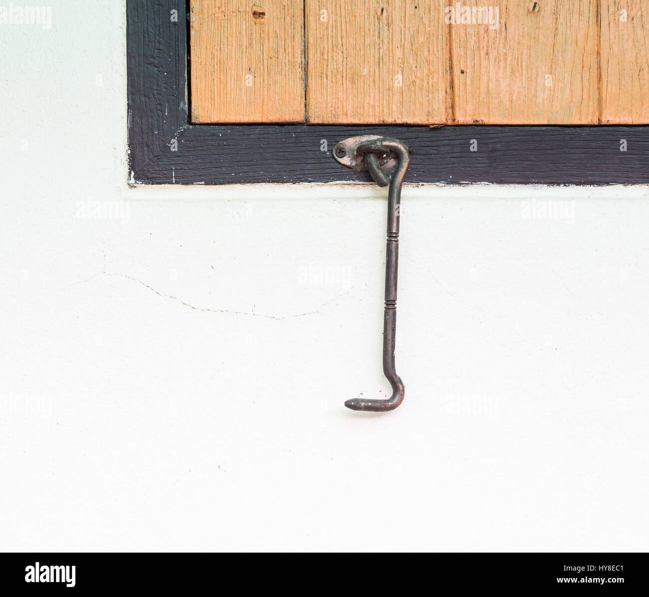Old metal hook under the wooden window of the Thai Temple Stock Photo ...