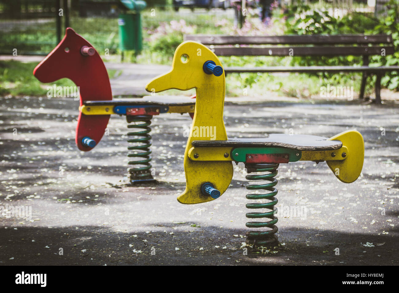 Playground rocking horses hi-res stock photography and images - Alamy