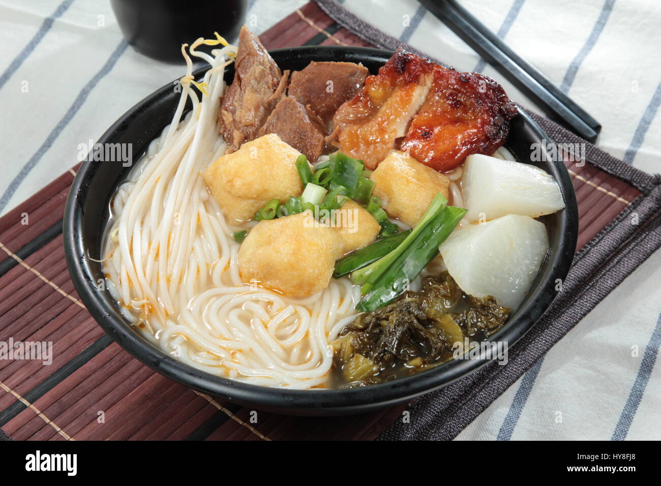 a cuisine photo of noodles with meat Stock Photo - Alamy