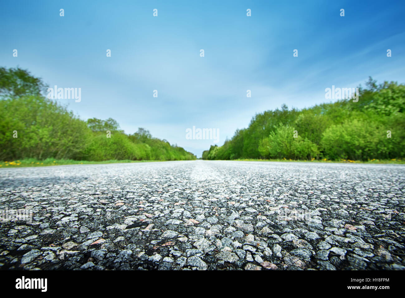 Asphalt road in beautiful spring day Stock Photo - Alamy