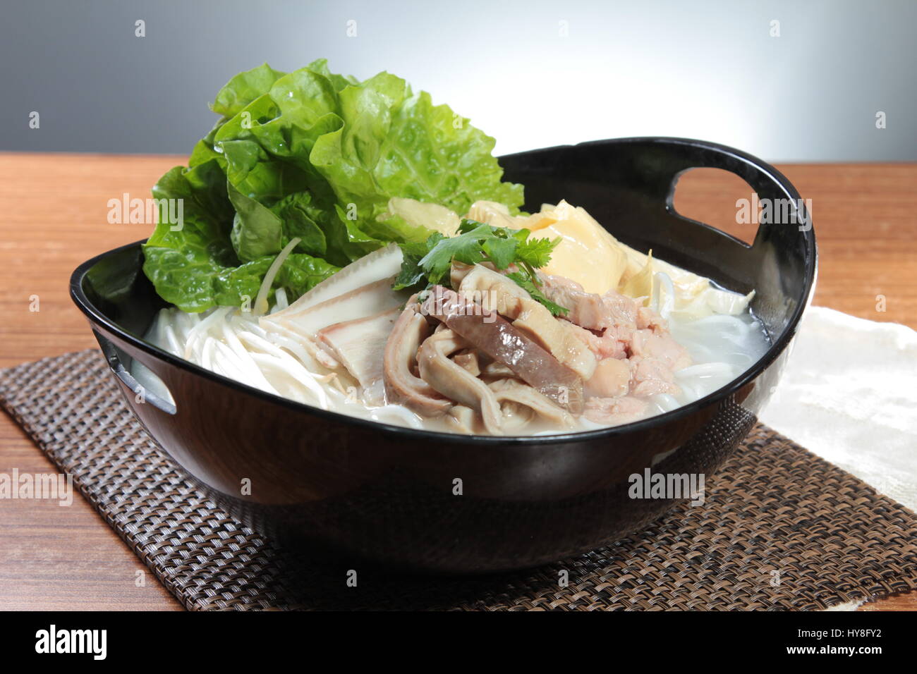 a cuisine photo of noodles with meat Stock Photo - Alamy