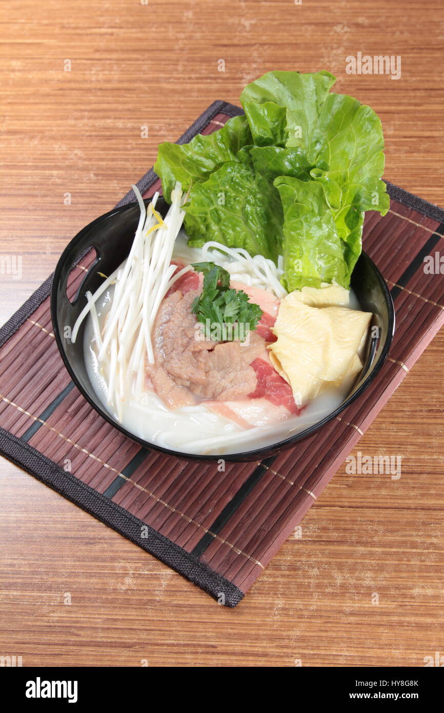 a cuisine photo of noodles with meat Stock Photo - Alamy