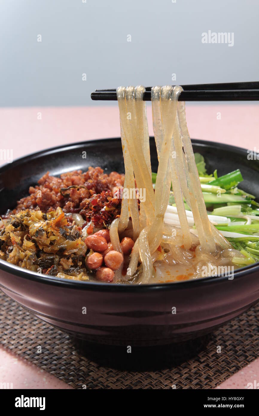 a cuisine photo of noodles with meat Stock Photo - Alamy
