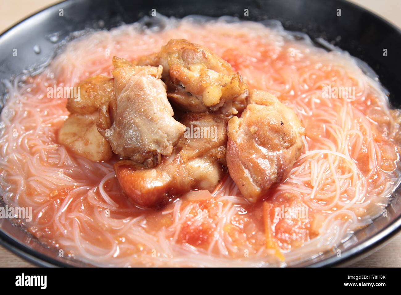a cuisine photo of noodles with meat Stock Photo - Alamy