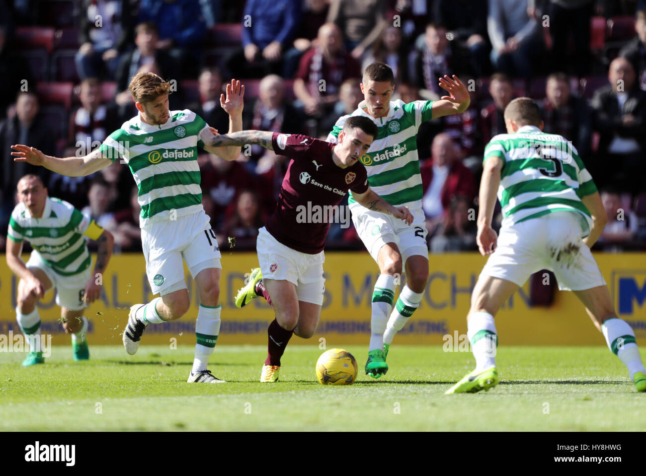 Heart of Midlothian's Jamie Walker runs at the Celtic defence during ...