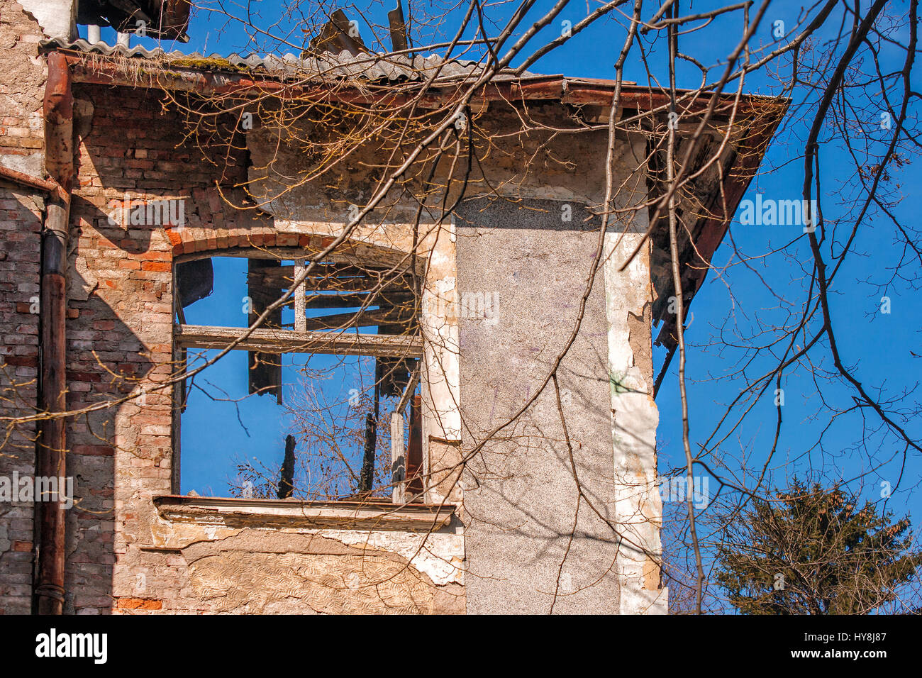 broken window in an abandoned house on sunny spring day closeup Stock ...