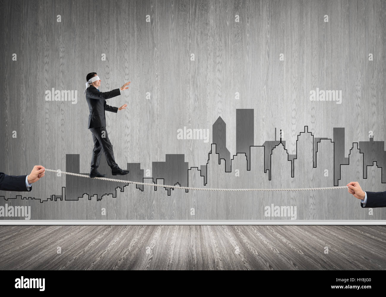 Business concept of risk support and assistance with man balancing on ...